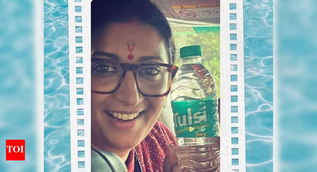 Smriti Irani shares a pic posing with ‘Tulsi’ packaged water bottle ...