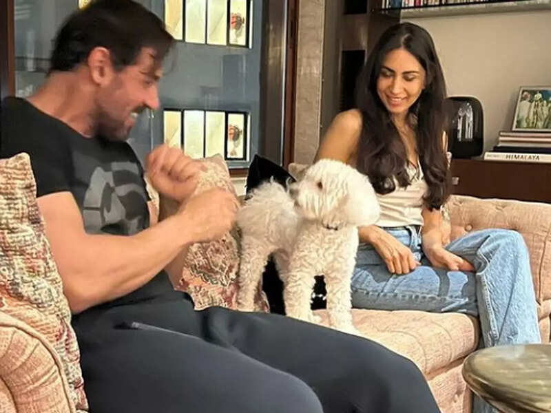 Priya Runchal shares a goofy picture of John Abraham with their pet ...