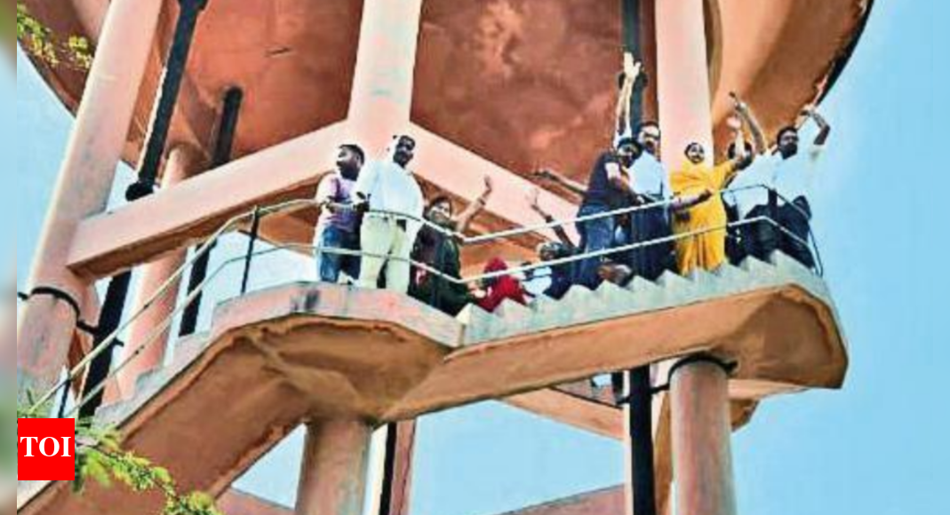 Rajasthan: BJP MLA climbs atop water tank to protest 'cops' inaction ...