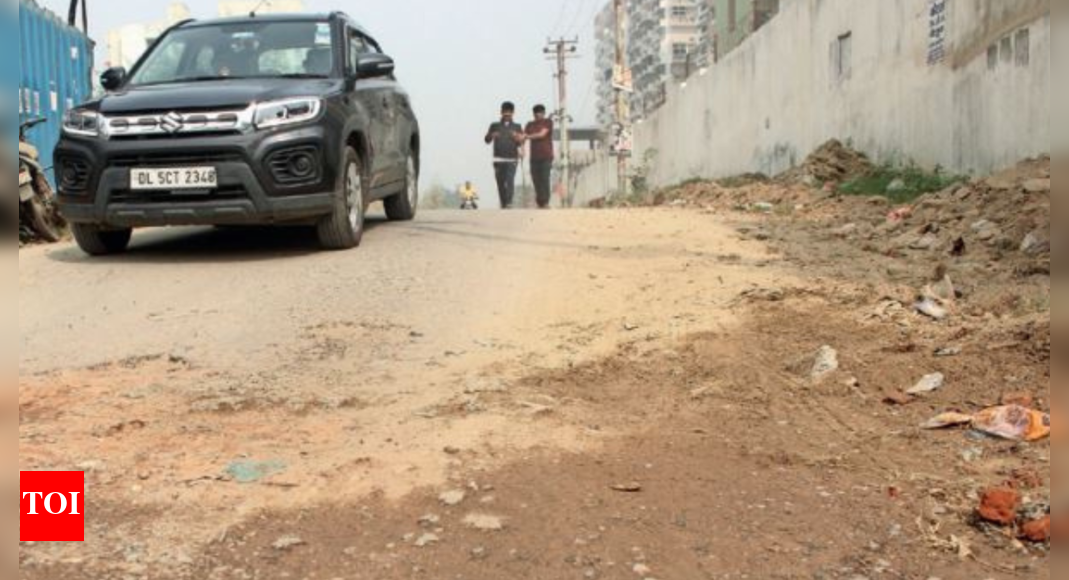 Writing on banners soon: Beware of the bumpy ride for 1km ahead ...