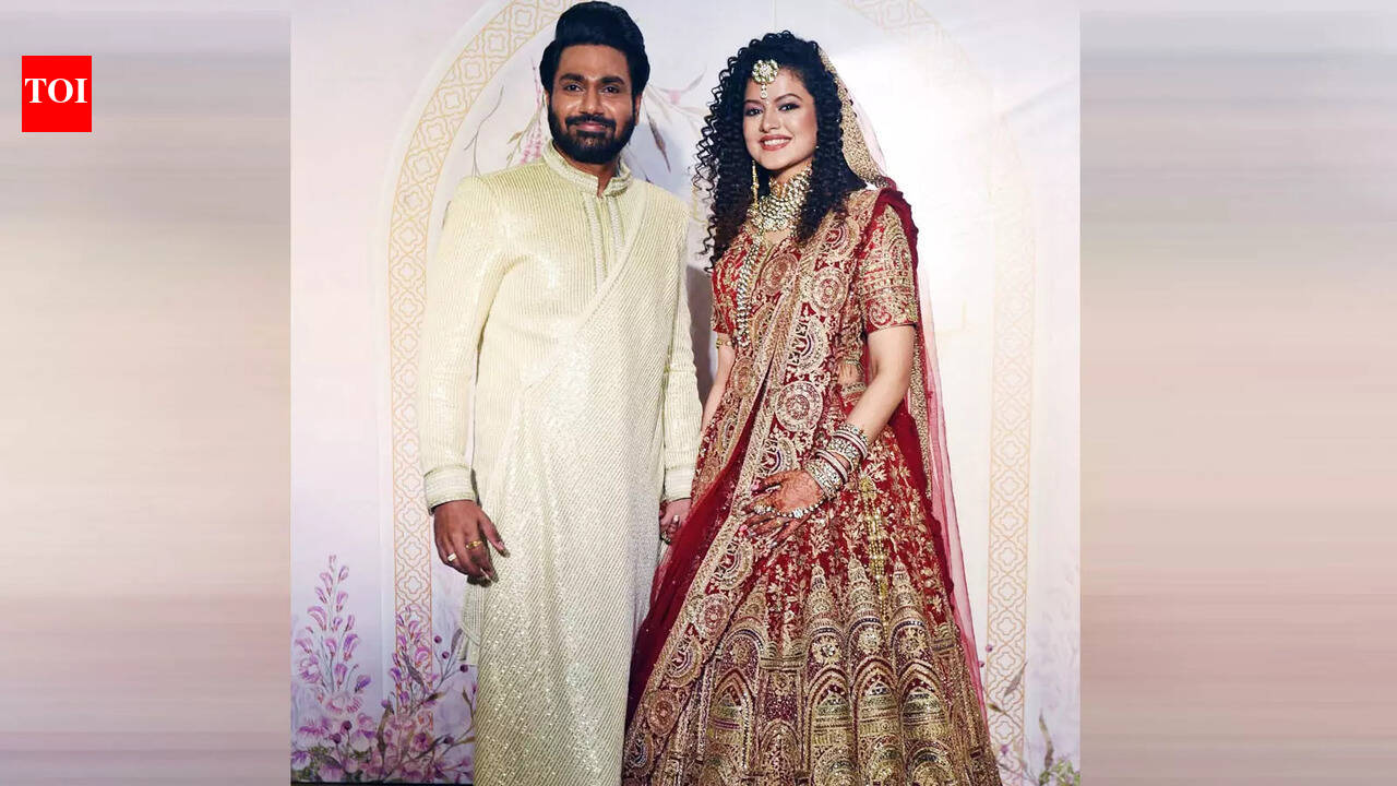 Meet the newly-weds: Mithoon and Palak Muchhal pose for the cameras at ...
