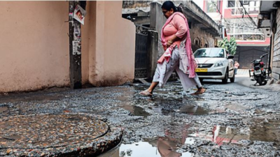 Delhi: Residents battle stench, poor infrastructure and broken roads ...
