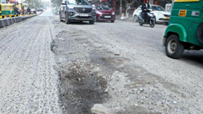 Bengaluru: Pothole-ridden double road cries for maintenance; motorists ...