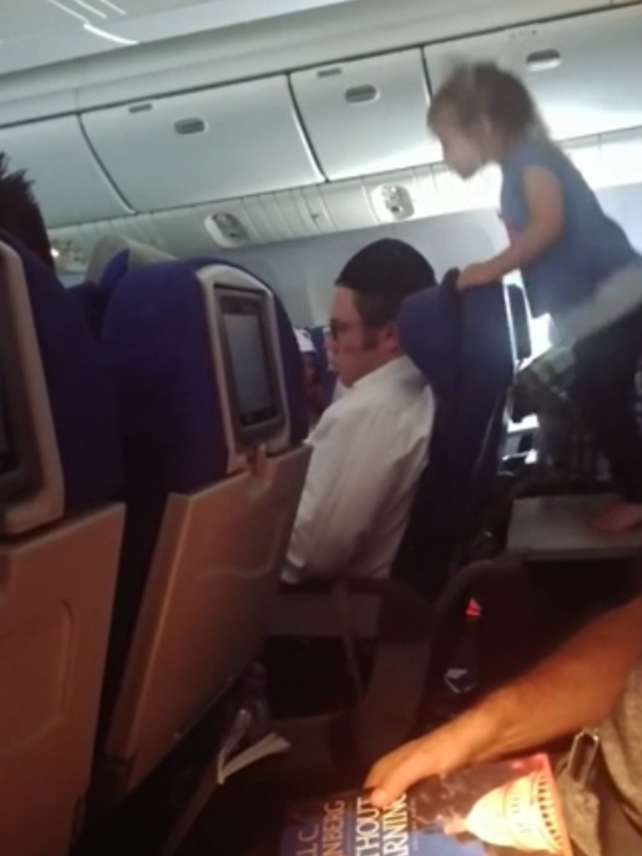 Child jumps on plane's tray table during 8-hour flight | Times Now