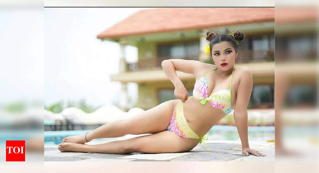 Sushma Adhikari shows her perfect curves in a neon bikini | Bhojpuri Movie News - Times of India