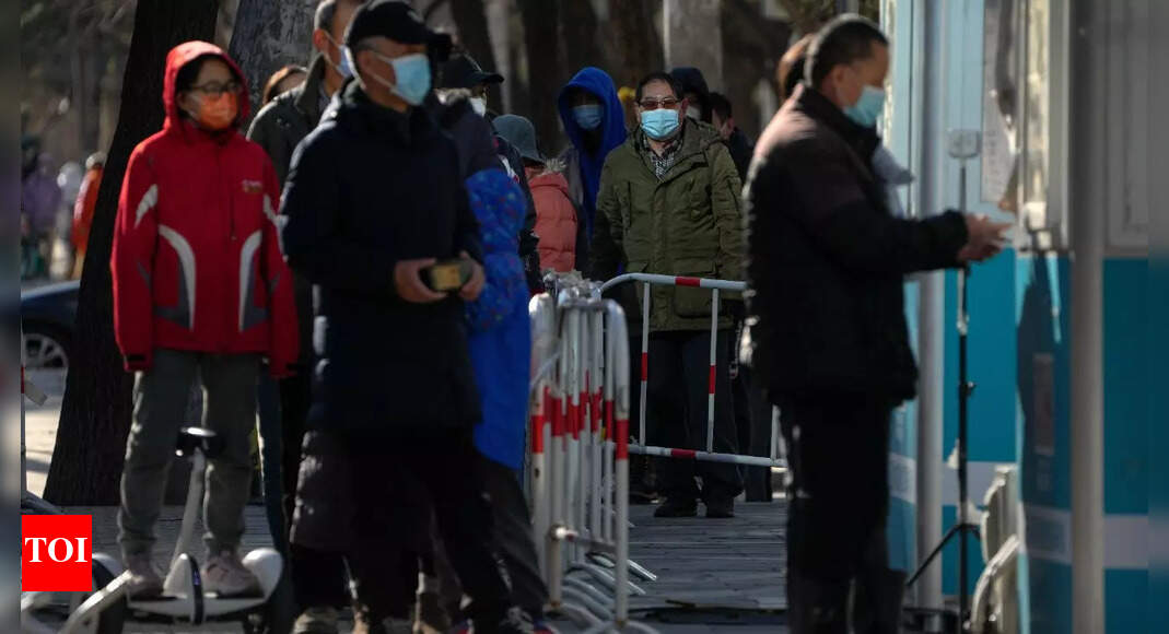 ‘Worked to the bone’: Chinese crematoriums battle Covid wave - Times of ...