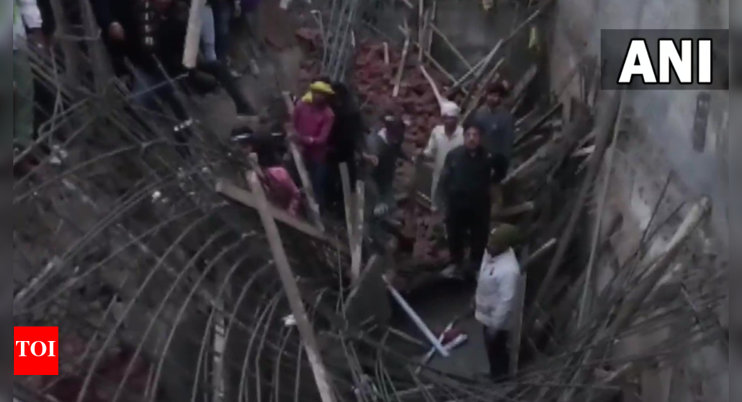 Four feared trapped after roof of building under construction collapses ...