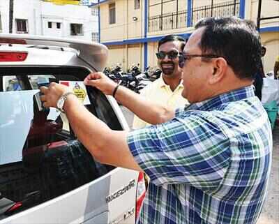 Stickers indicating ‘E’ to be pasted on vehicles of senior citizens ...