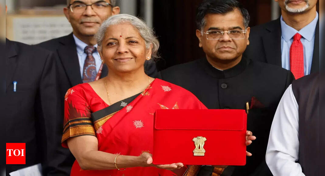 Sitharaman takes tablet in red pouch to Parliament to present paperless ...