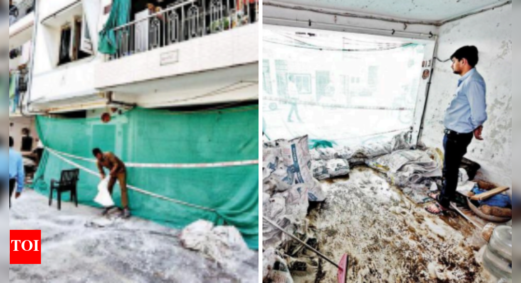 Families Shifted, But Sludge Continues To Flood Streets | Surat News ...