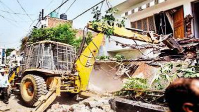 Atiq: Atiq Ahmed's close aide's house razed in Prayagraj; firearms ...