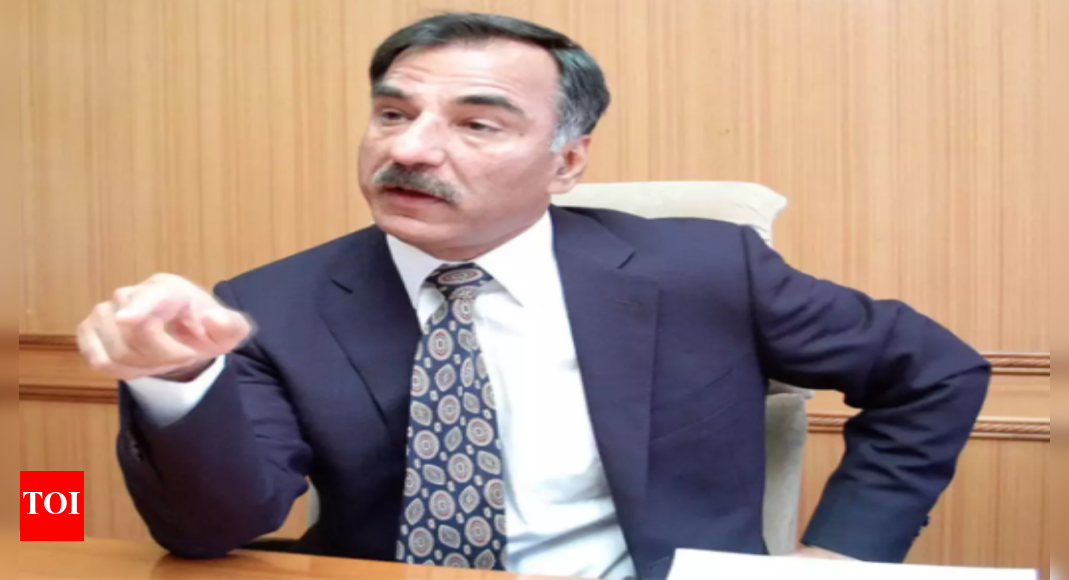 In Gujarat, ex-IAS officer Pradeep Sharma held in fresh case of land ...