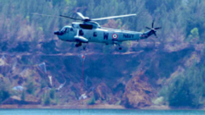 Indian Navy choppers with ‘Bambi Buckets’ waterbomb Morlem flames | Goa ...