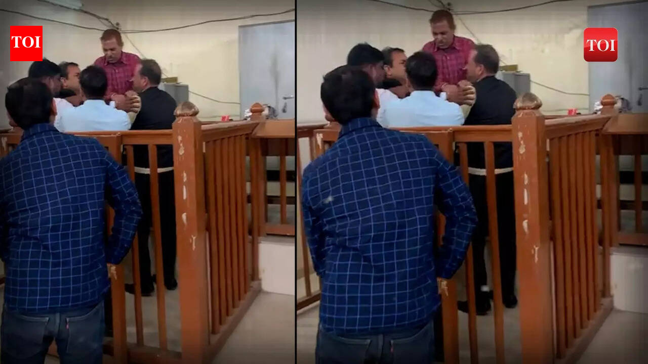 Video of scuffle between an advocate and a party in the premises of UP ...