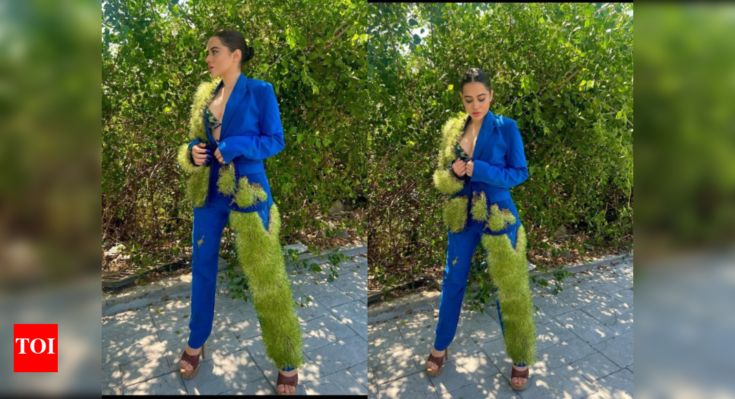 Uorfi Javed wears a formal suit with grass patches on her body for ...