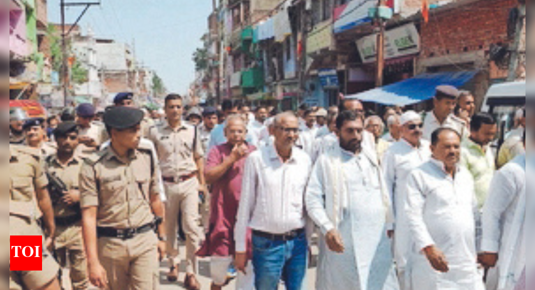 Hundreds march for peace in Biharsharif | Patna News - Times of India