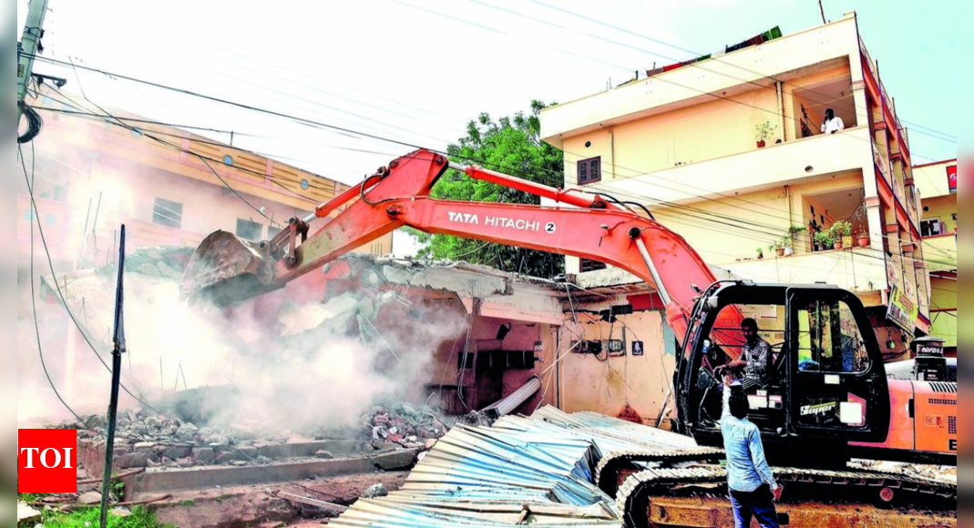 Secunderabad Cantonment Board bulldozes illegal structures built when poll code in force ...