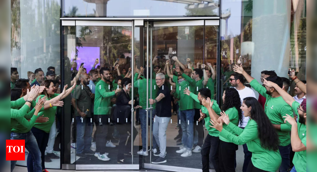 Tim Cook opens gate to Apple's first-ever store in India - Times of India