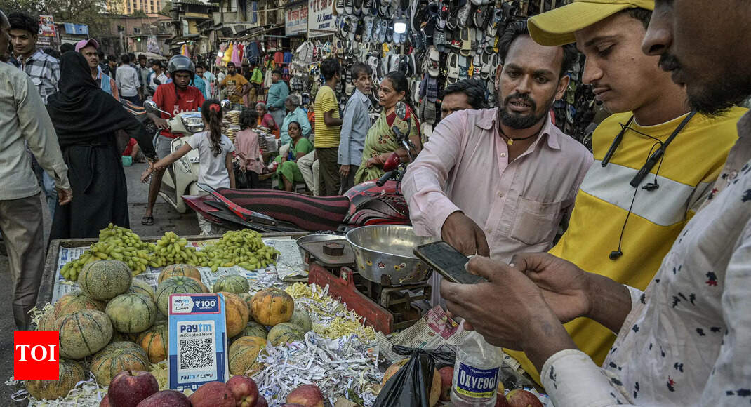A Coconut seller wins the internet with QR Code at the back of his bike ...