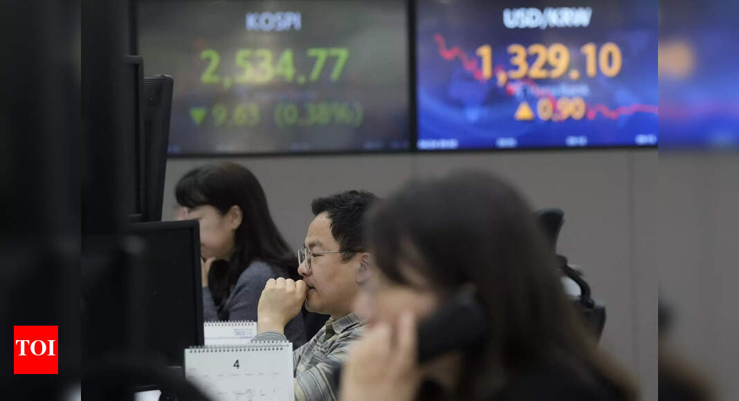 Stock markets today: Global stocks lower ahead of US data - Times of India