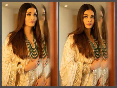 Aishwarya Rai Bachchan is a vision to behold as she stuns in a white anarkali dress and kundan ...