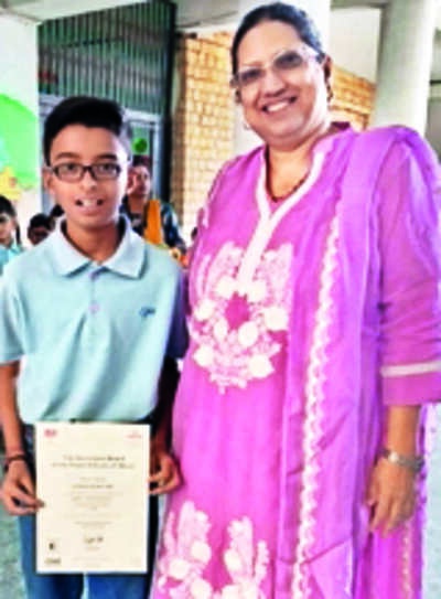 Atishay Shines In Piano Exam | Nagpur News - Times of India