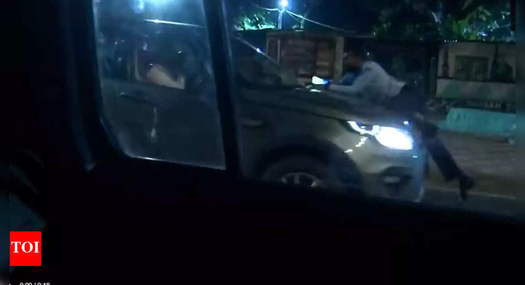 Delhi News: Man dragged on car's bonnet for 2-3 km near Ashram Chowk | Delhi News - Times of India