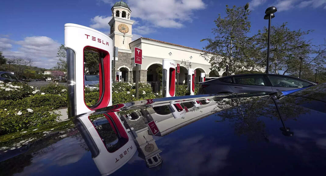 GM to integrate Tesla charging standard in future EVs | TOI Auto GM to integrate Tesla charging standard in future EVs | TOI Auto