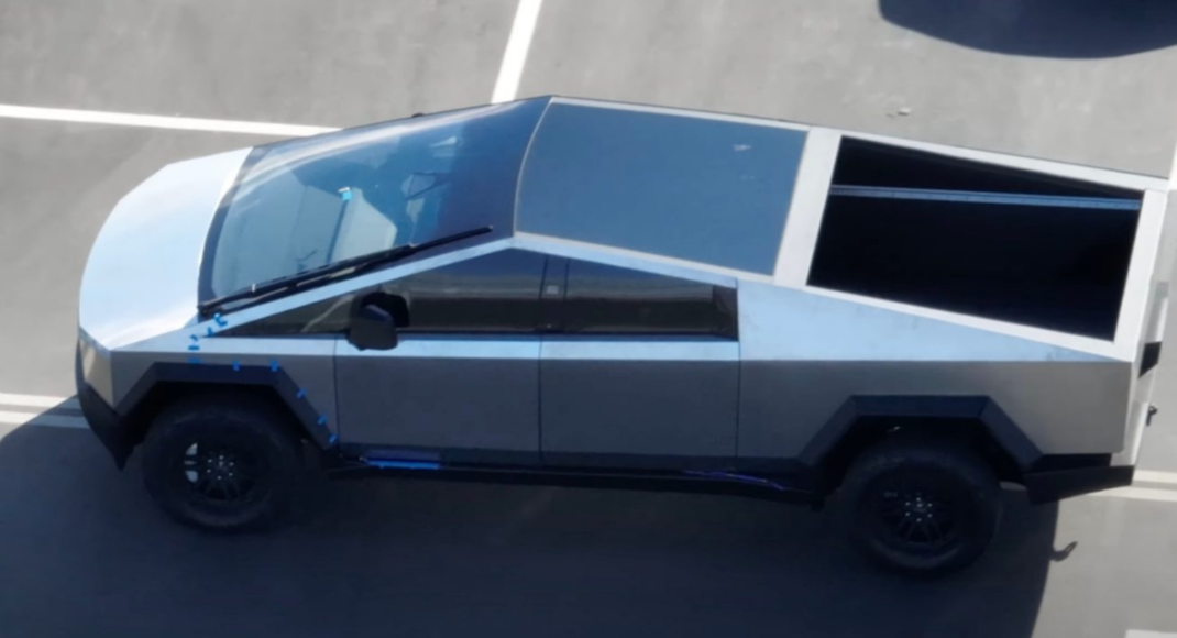 Tesla Cybertruck with updated design spotted on test track | TOI Auto